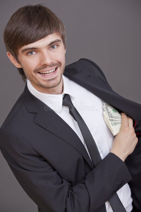 Taking bribe stock photo. Image of portrait, holding - 17712544