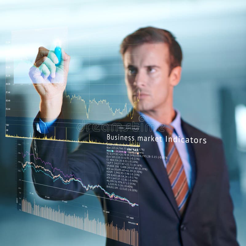 Taking Business into the Future. a Handsome Young Businessman Using a Digital Interface. Stock ...