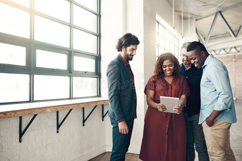 Taking Care of Team Tasks with Smart Apps. a Group of Businesspeople ...