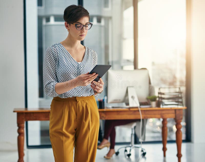 Taking Charge of Business with the Help of Technology. a Young Creative ...