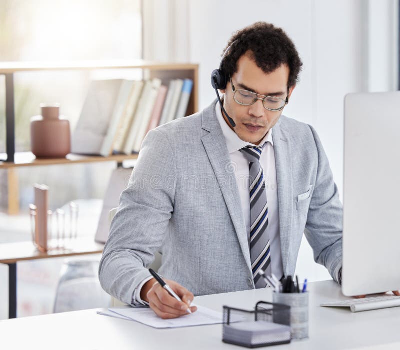 Taking Clear Notes of the Issues he Needs To Resolve. a Young Call ...