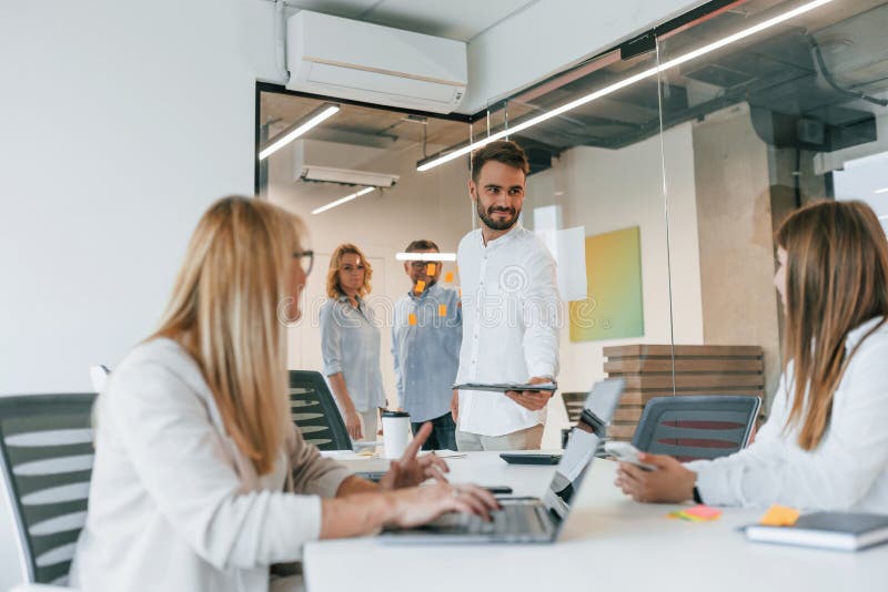 Taking the Documents. Group of Professional Business People is in the ...