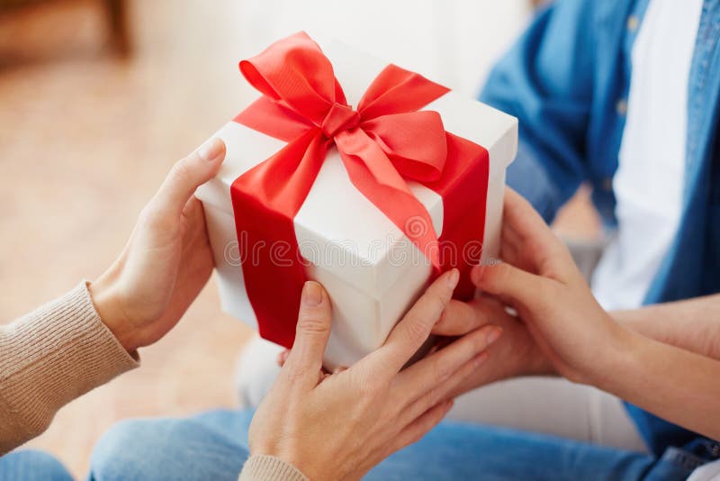 Taking gift stock image. Image of giving, human, focus - 58242645