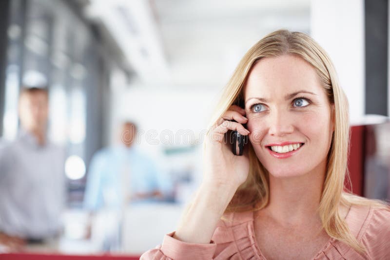 Taking an Important Business Call. a Young Professional Talking on Her ...