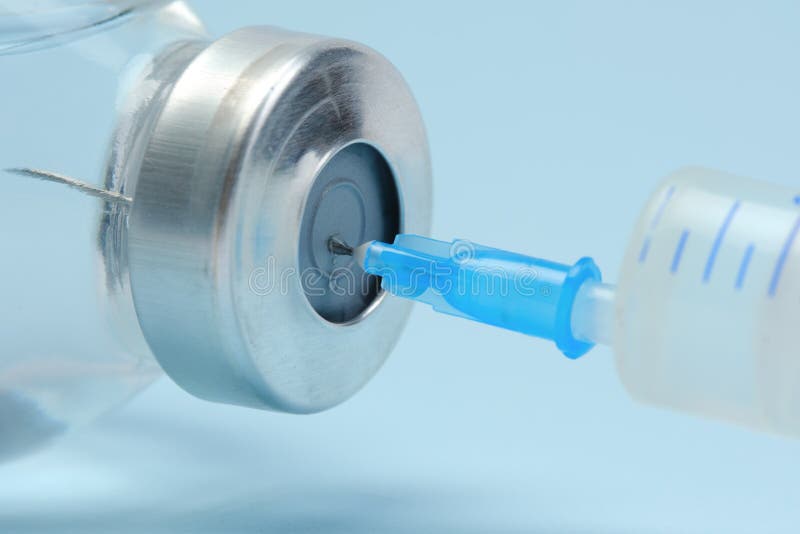 Taking Medication into a Syringe for Injection. Closeup Macro Stock ...