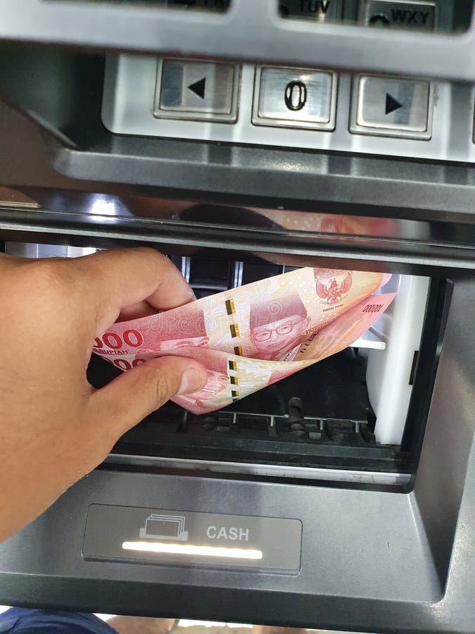 Taking money from ATM stock photo. Image of limb, person - 261745058