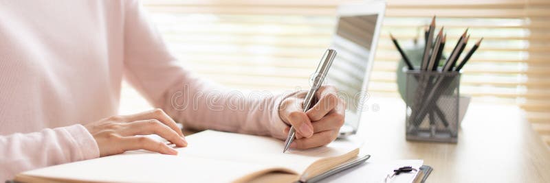 Taking Note, Close-up Hand Writing an Important Message in Notebook ...