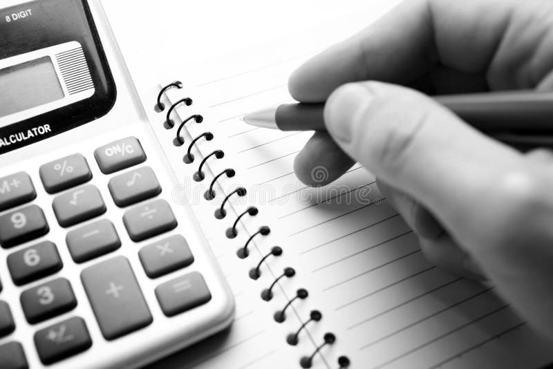 Calculator and Ink Pen on Paper Notepad Stock Image - Image of ...