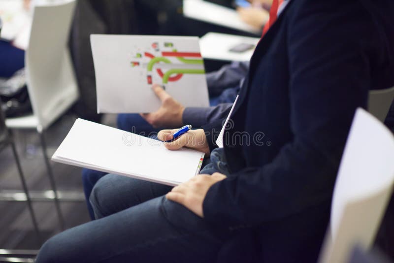 Taking Notes on Business Conference Stock Photo - Image of document ...