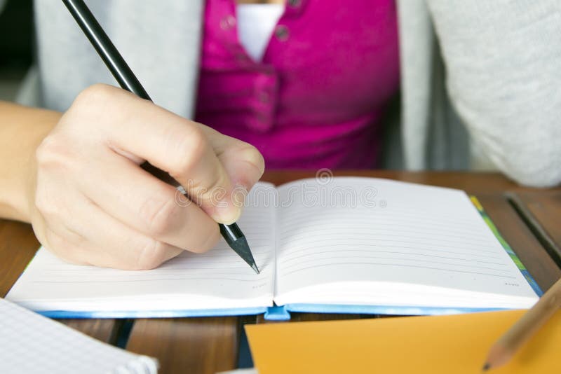 Taking notes stock image. Image of pencil, holding, message - 35375341
