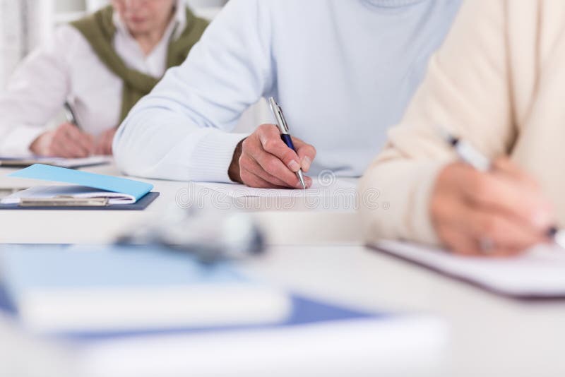 Taking Notes from a Lecture Stock Photo - Image of answers, diligent ...
