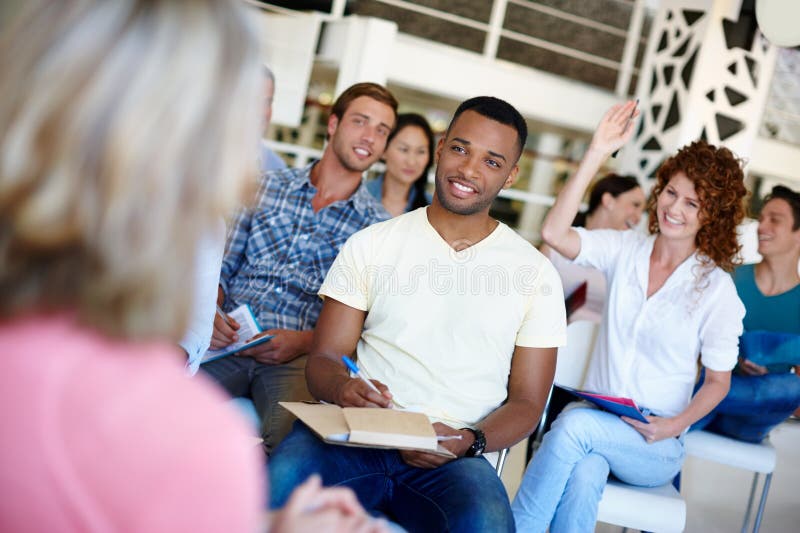 Taking Notes To Remember it All. Woman Asking a Question during a ...