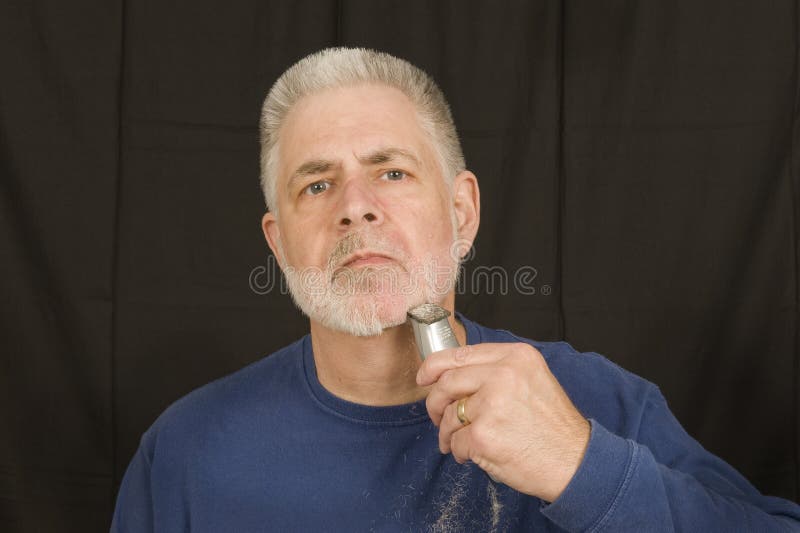 Taking Off the Beard stock image. Image of caucasian - 50758577