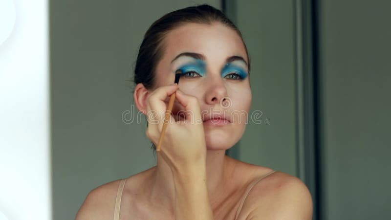 Taking Off Her Make-up. Beautiful Cheerful Young Woman Using Brush and ...