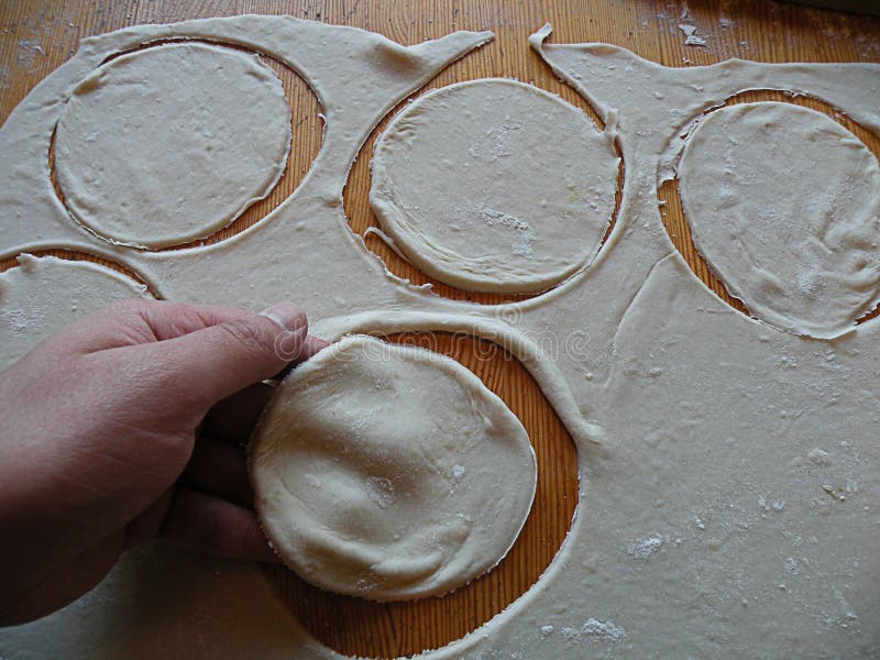 Taking off a round dough stock photo. Image of round - 103702790