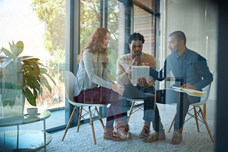 Taking the Office Online. a Group of Creatives Working Together on a ...