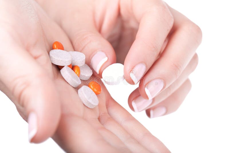 Taking one pill from pile stock photo. Image of doctor - 29311896