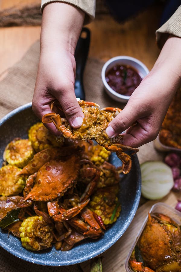 Taking and Opening the Crab before Eating it Stock Photo - Image of ...