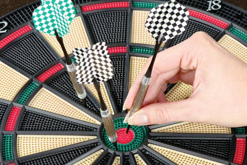 Taking Out Dart from Dartboard Stock Photo - Image of point, success ...