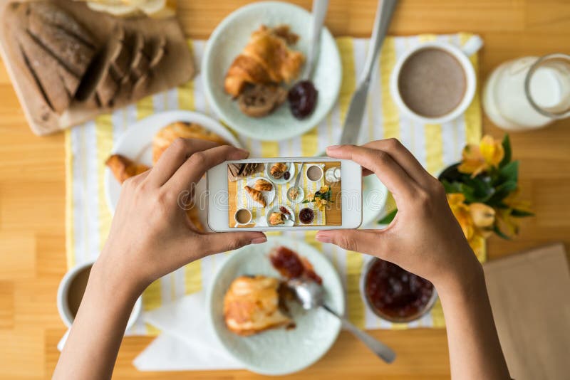 Taking photo of breakfast stock image. Image of tasty - 54294623