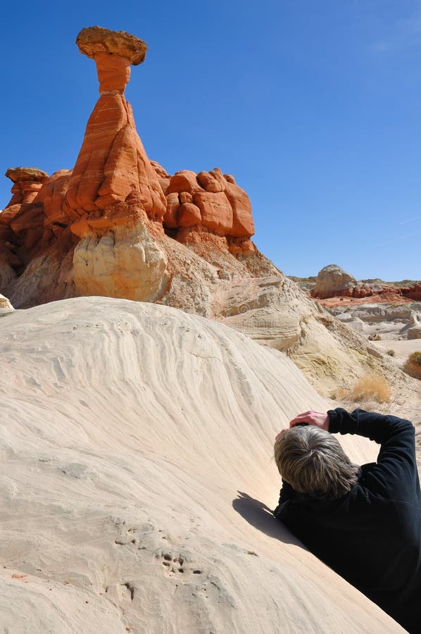 Taking Photo of Paria Rimrocks Red Toadstool (Hoodoo) Stock Photo ...