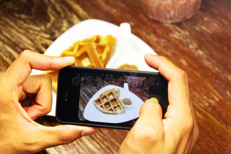 Taking Photo of Their Food with Smart Phone Stock Photo - Image of ...
