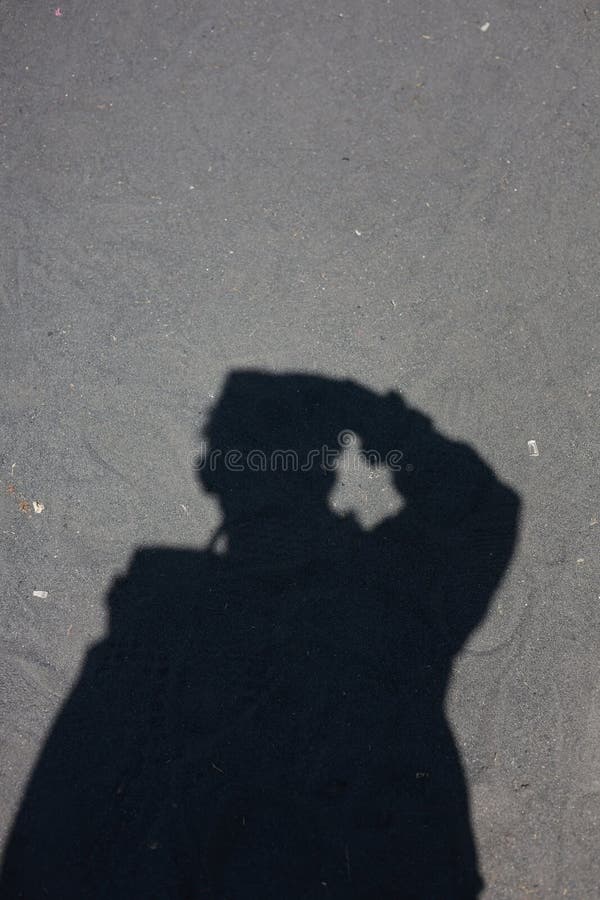 Taking a Photo of Your Own Shadow in the Sand while on a Tour of Mount ...