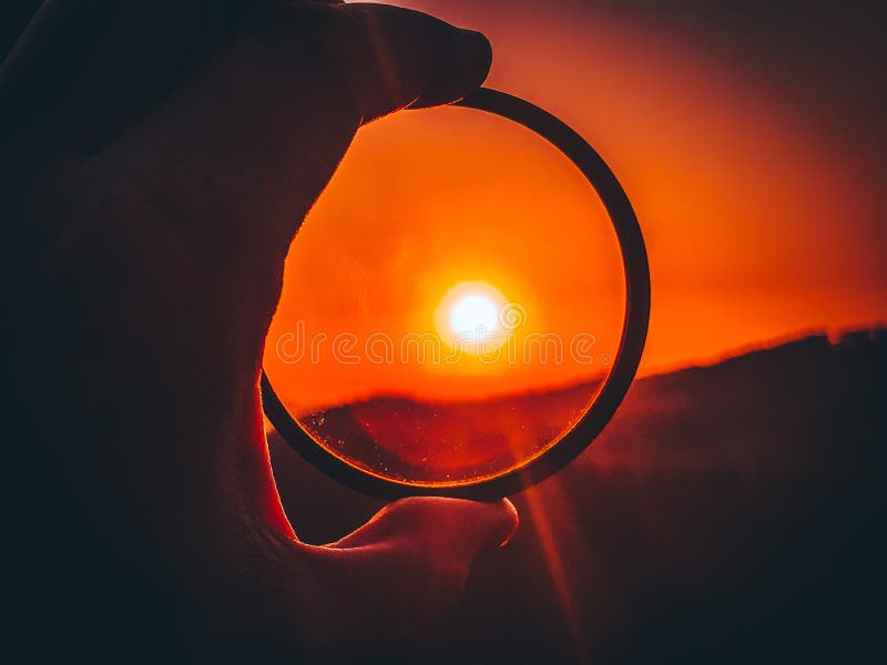 Taking Photos of Sunset through the Camera Filter Inside Nature Stock ...