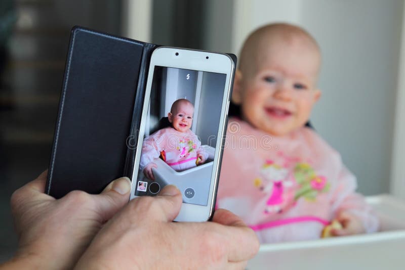 Taking a Picture of a Baby with a Mobile Phone Stock Photo - Image of ...