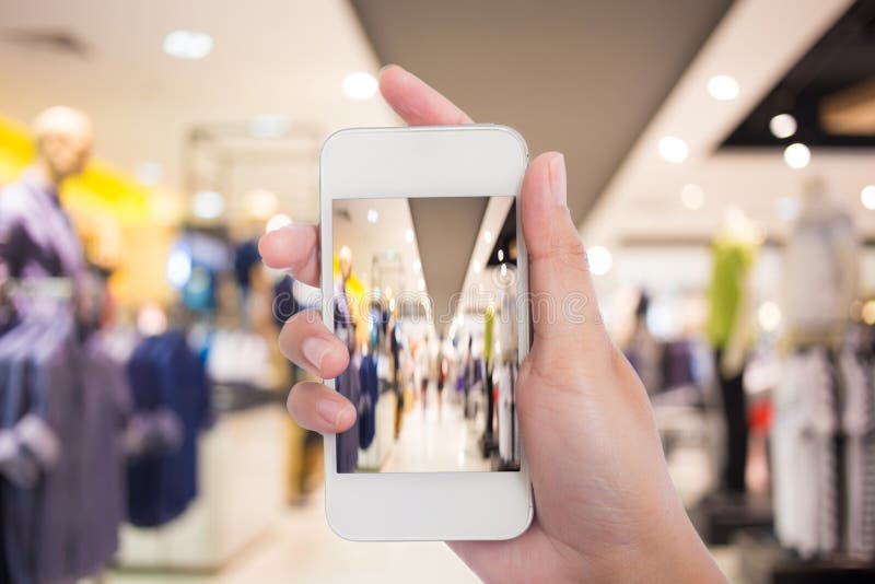Taking a Picture with a Smart Phone in Shopping Mall. Stock Photo ...