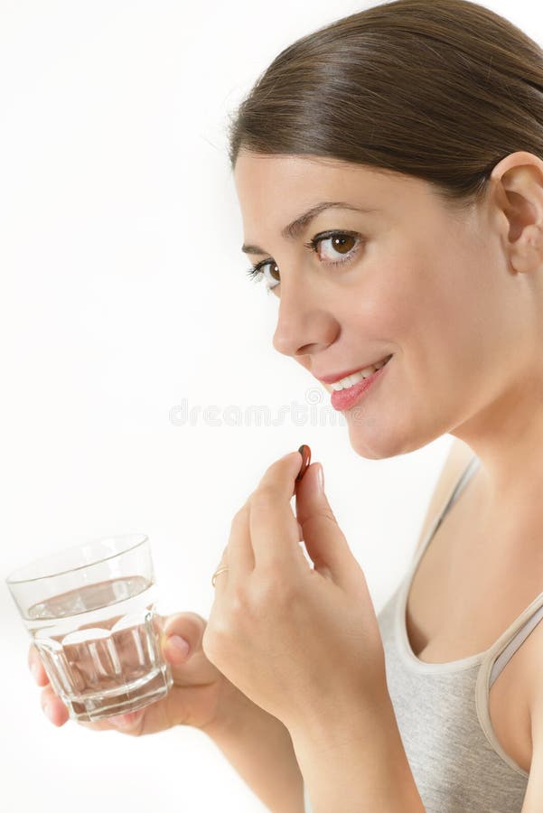 Taking a Pill stock photo. Image of grippe, capsule, aspirin - 45678044