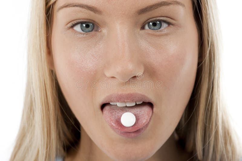 Taking pills stock image. Image of blond, contorl, female - 16149219
