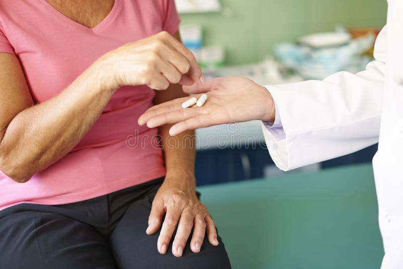 Taking pills stock photo. Image of medical, people, patient - 46799132