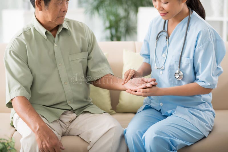 Taking pulse stock image. Image of senior, professional - 63444521