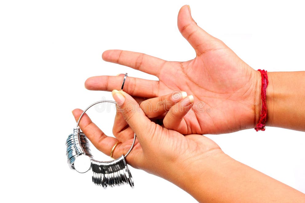 Taking ring size stock photo. Image of ring, fingers - 10291952