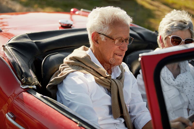 Taking a Road Trip is a Great Retirement Idea. a Senior Couple Going on a Road Trip. Stock Image ...