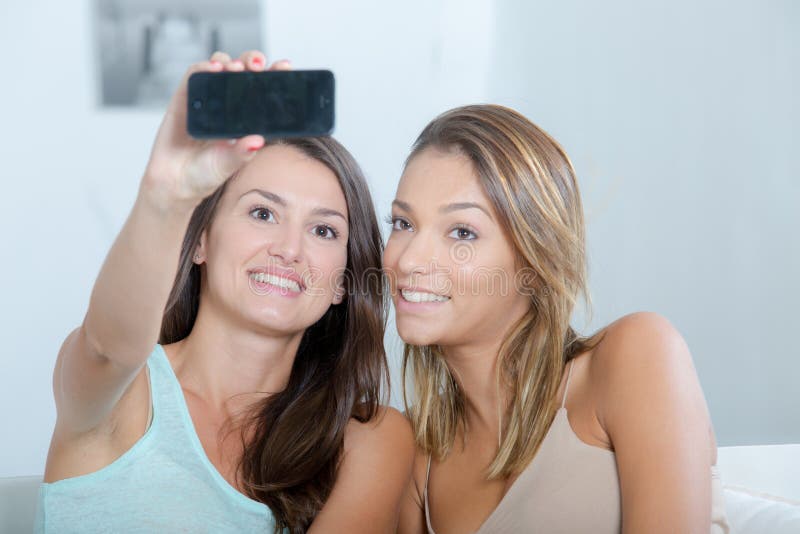 Taking and sharing selfies stock image. Image of pleasure - 118388595