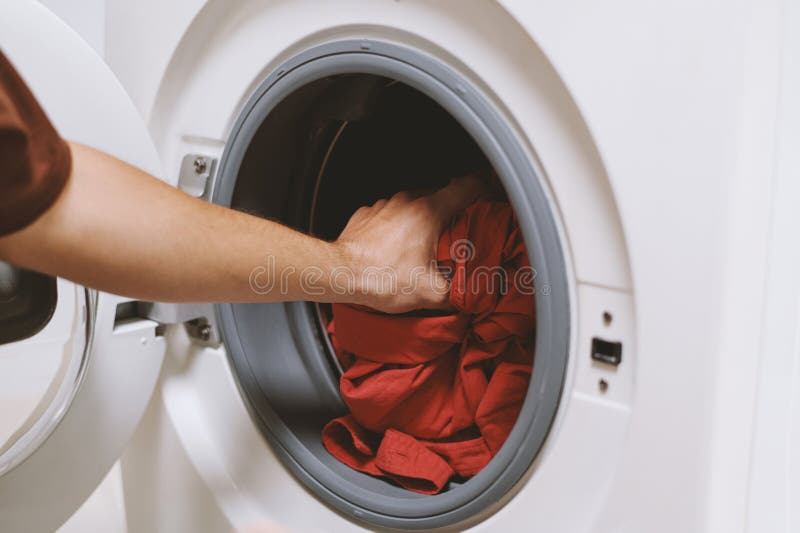 Taking Shirts Out of Washing Machine Stock Photo - Image of automatic ...