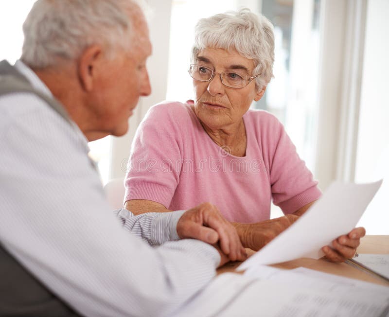 Taking Time To Discuss Important Matters. Shot of Two Elderly People ...