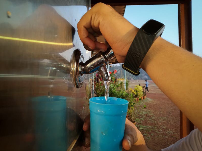Taking Water into Glass by Pressing Tap by Hands Stock Image - Image of ...