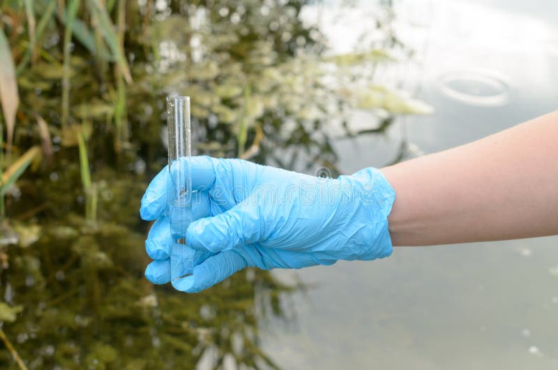 Taking a Water Test for Analysis from a Reservoir. Stock Photo - Image ...