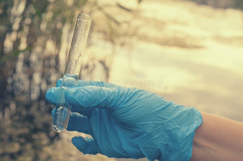 Taking a Water Test for Analysis from a Reservoir. Stock Photo - Image ...