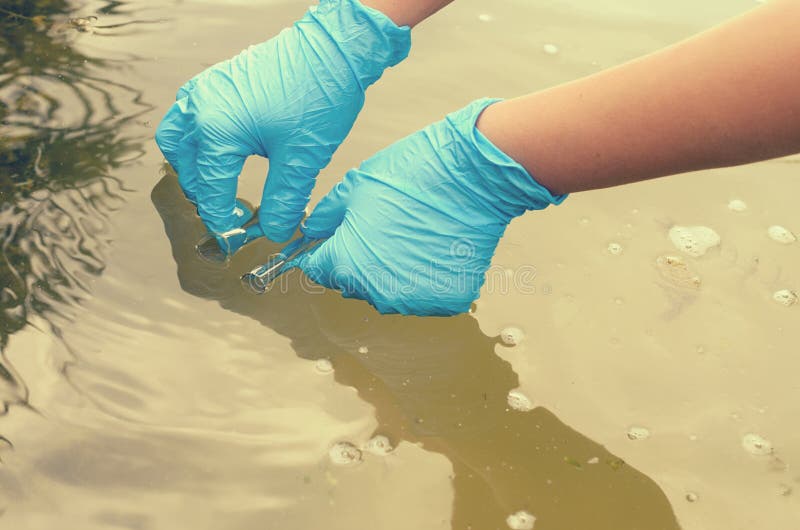 Taking a Water Test for Analysis from a Reservoir. Stock Image - Image ...
