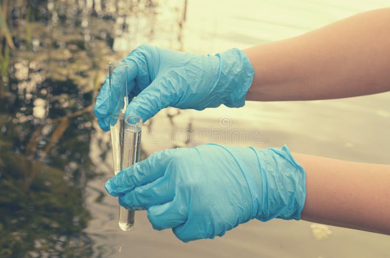 Taking a Water Test for Analysis from a Reservoir. Stock Image - Image ...