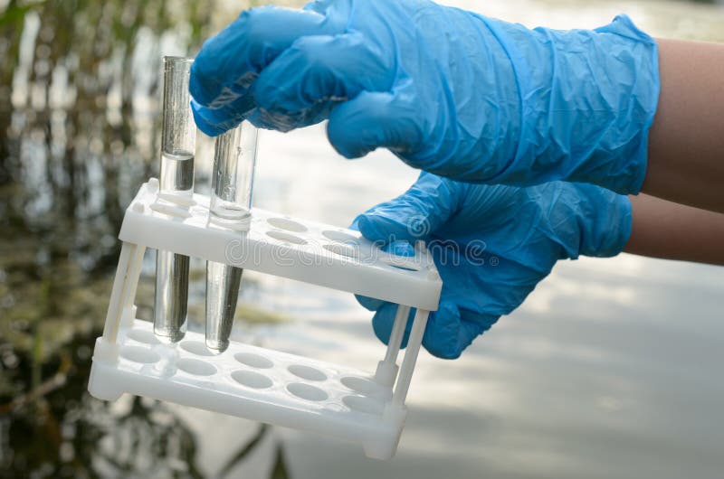 Taking a Water Test for Analysis from a Reservoir. Stock Photo - Image ...