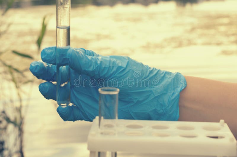 Taking a Water Test for Analysis from a Reservoir. Stock Image - Image ...