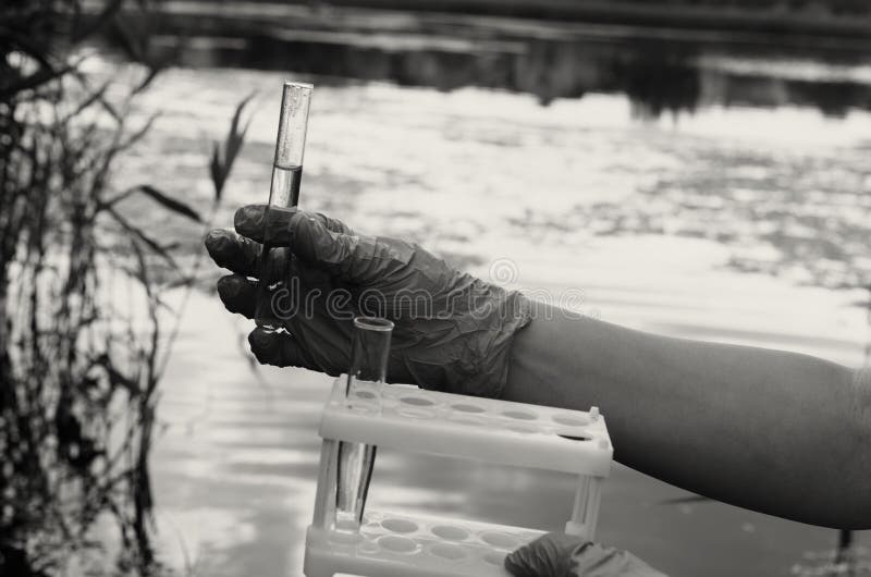 Taking a Water Test for Analysis from a Reservoir. Stock Photo - Image ...