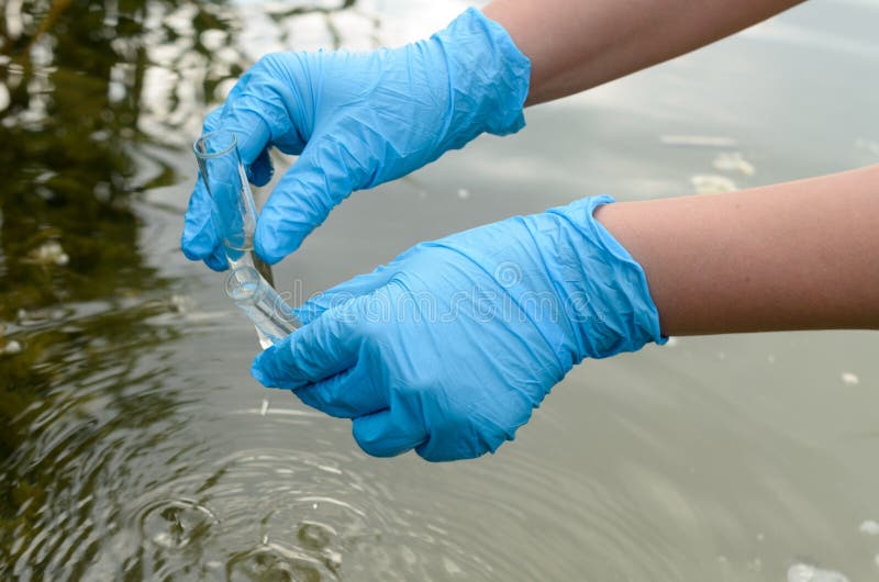 Taking a Water Test for Analysis from a Reservoir. Stock Photo - Image ...