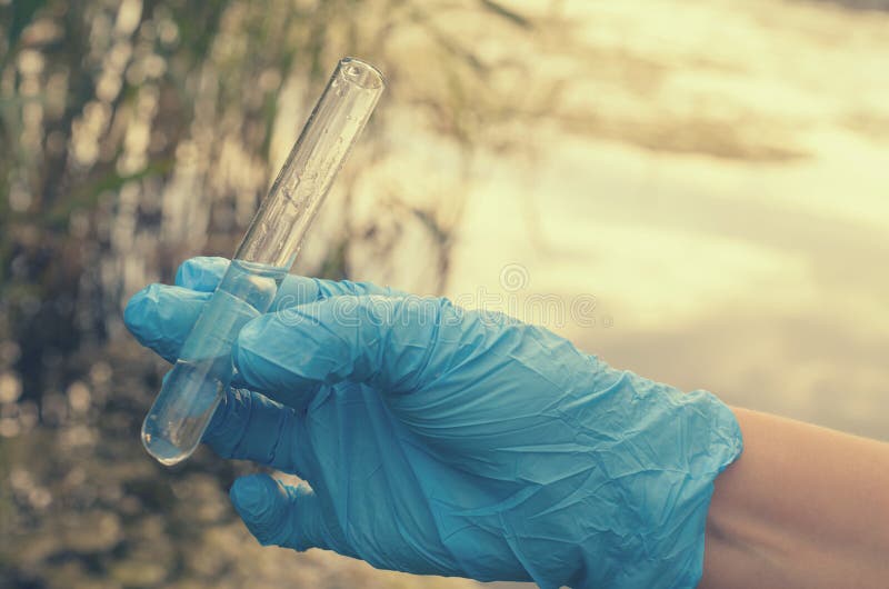 Taking a Water Test for Analysis from a Reservoir. Stock Photo - Image ...