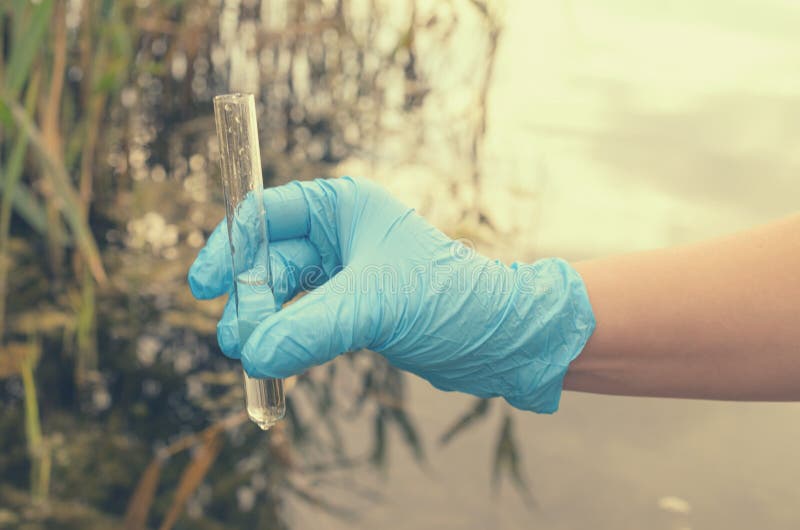 Taking a Water Test for Analysis from a Reservoir. Stock Photo - Image ...